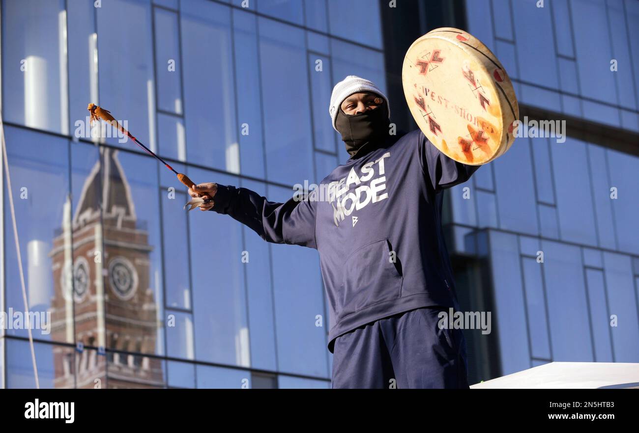 Seattle Seahawks' Marshawn Lynch beats on a Native American drum he was ...