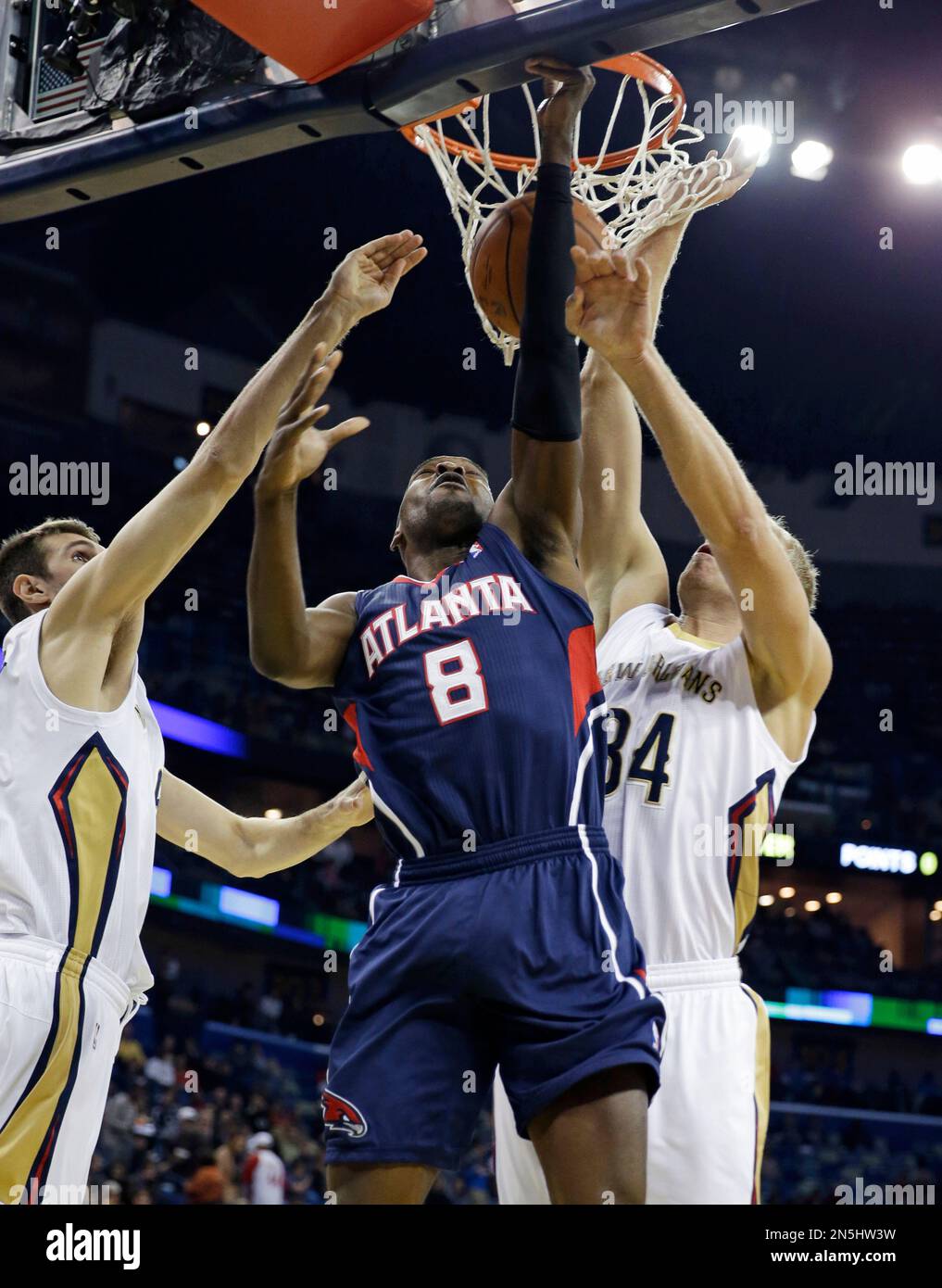 Atlanta Hawks point guard Shelvin Mack (8) is blocked as he goes to the ...