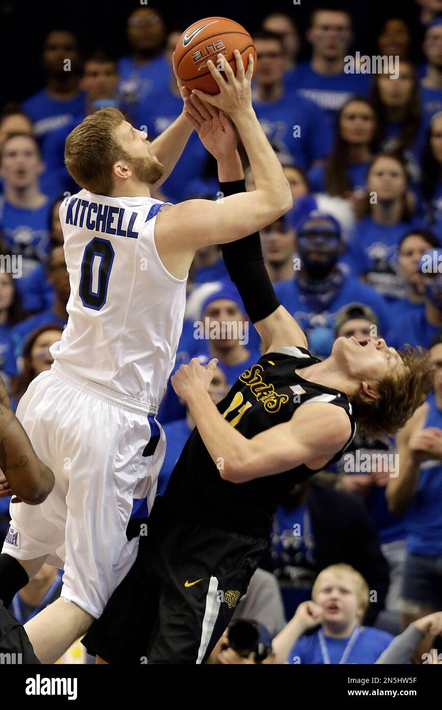 Indiana State forward Jake Kitchell, left, is fouled by Wichita State ...
