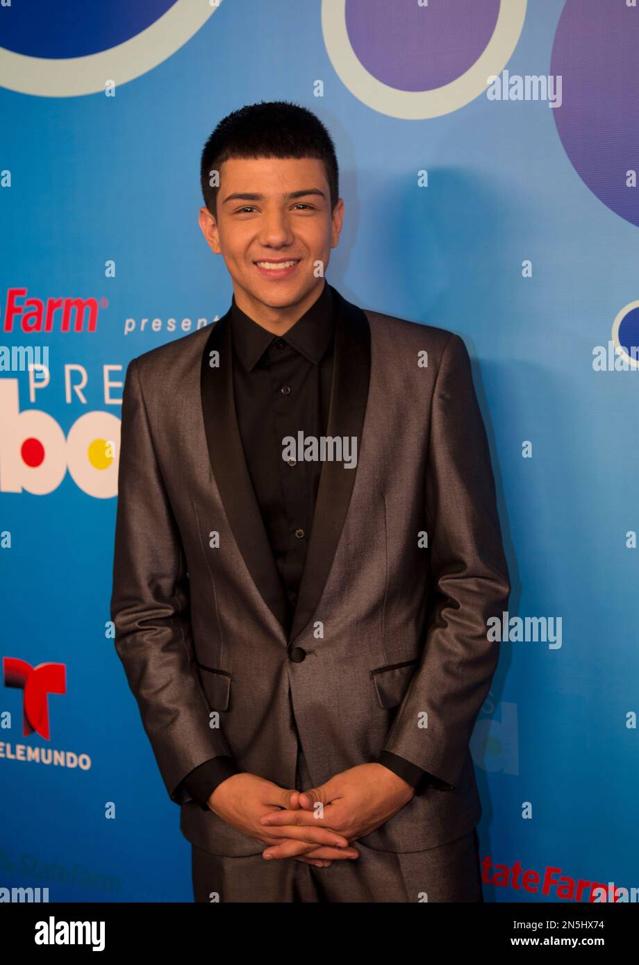 Singer Luis Coronel poses on the red carpet after a news conference ...