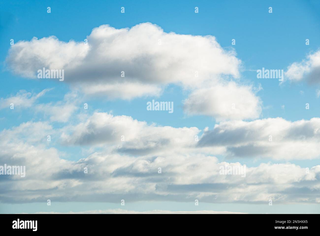 Blue sky with white clouds Stock Photo - Alamy