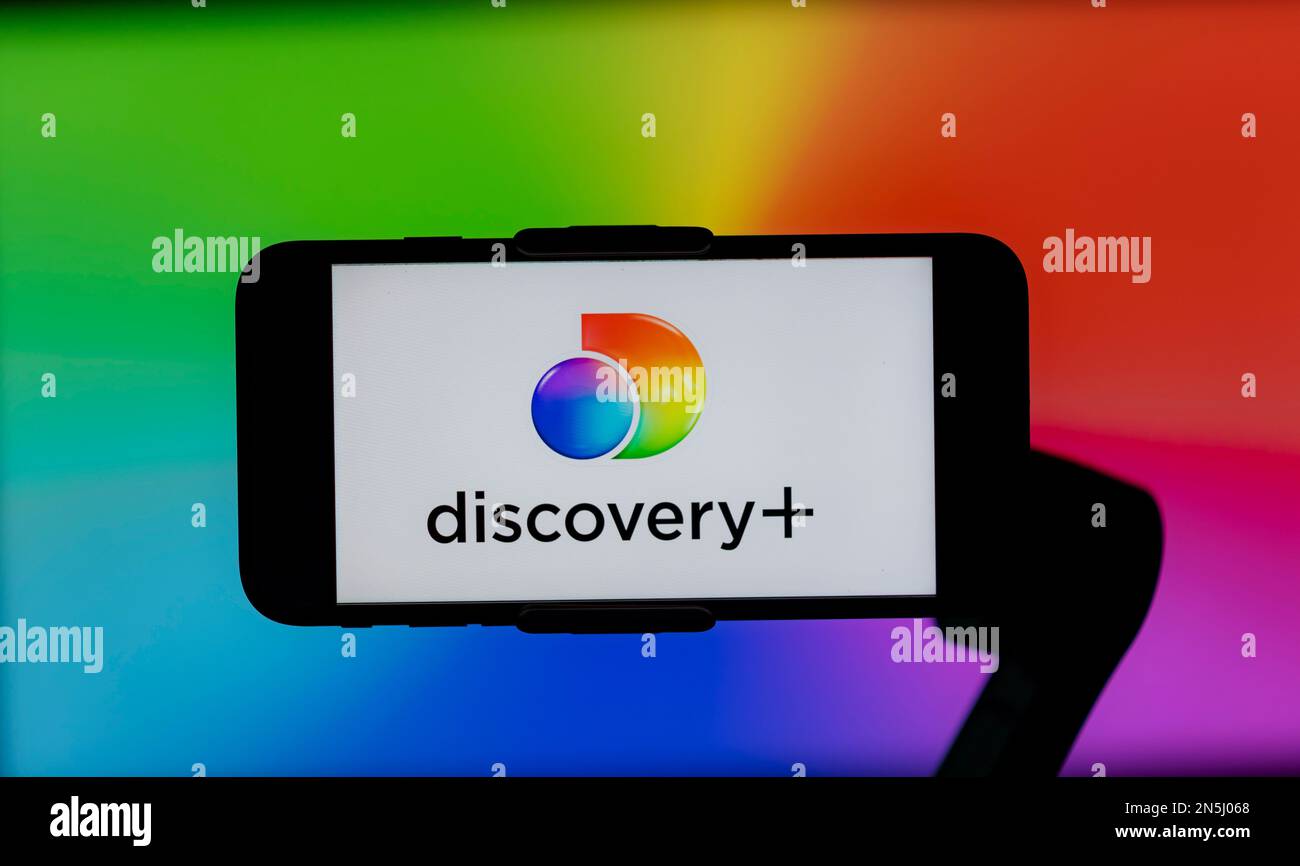 In this photo illustration, the discovery+ logo is seen displayed on a ...