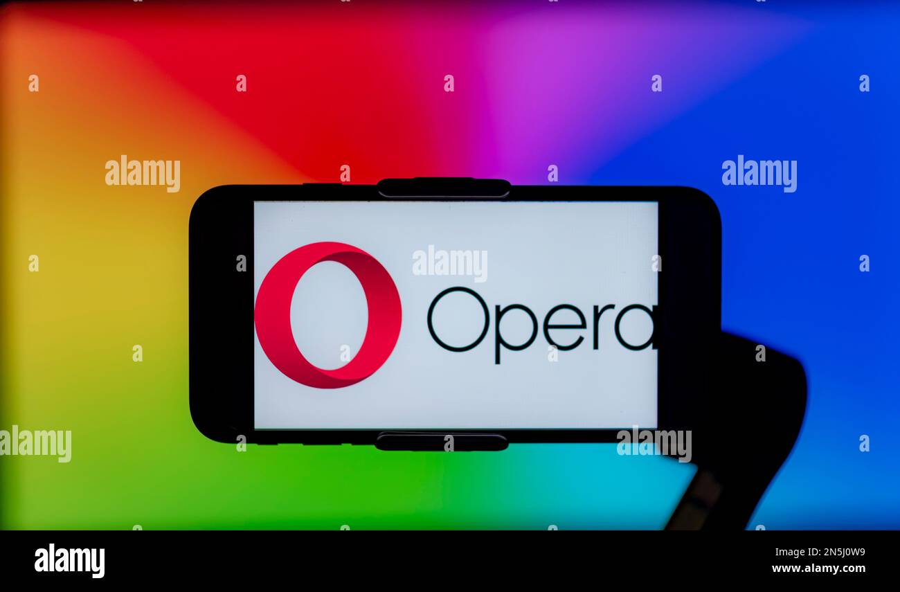 In this photo illustration, the Opera logo is seen displayed on a ...