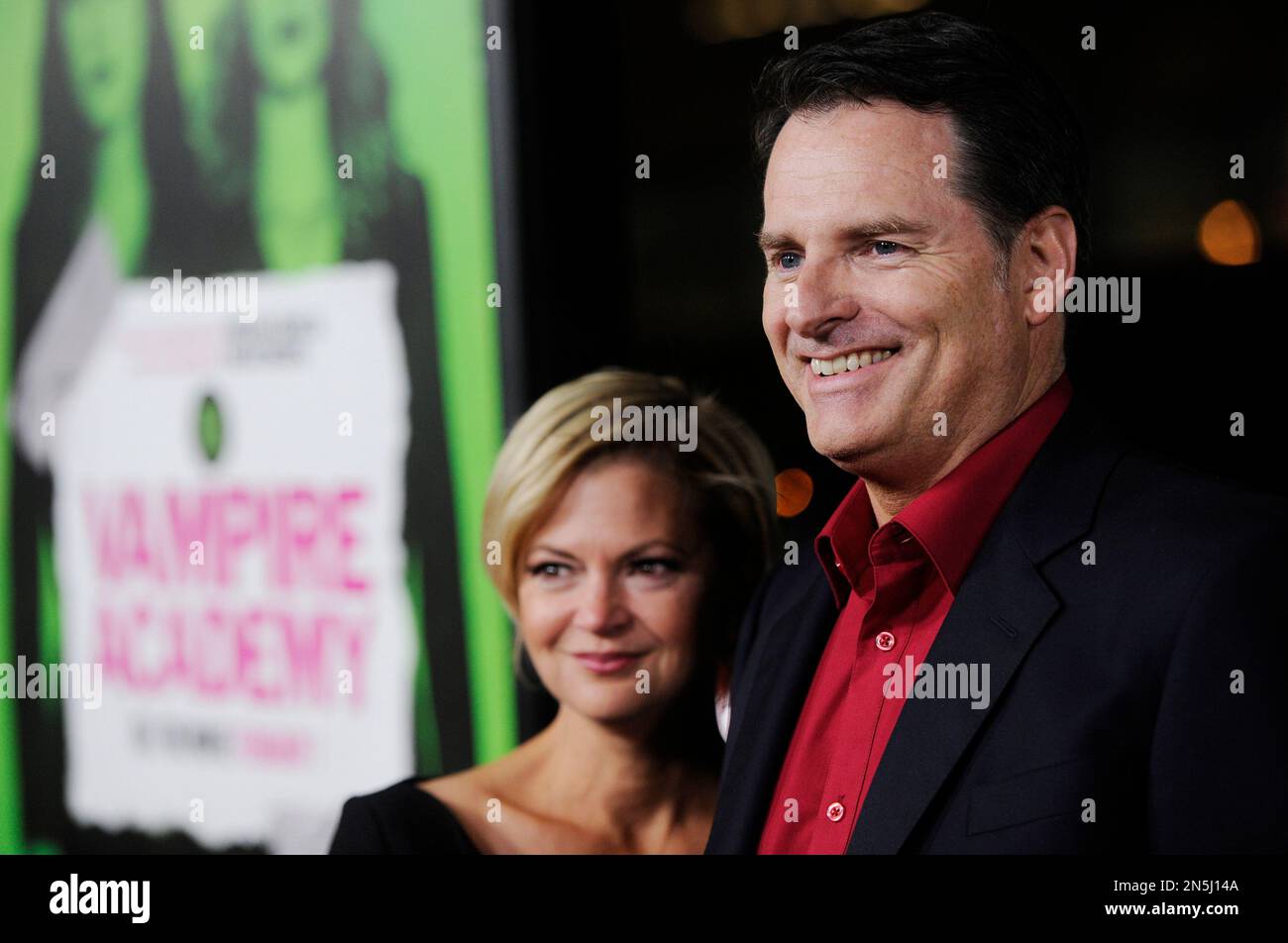 Mark Waters, director of "Vampire Academy," poses with his wife Dina at ...