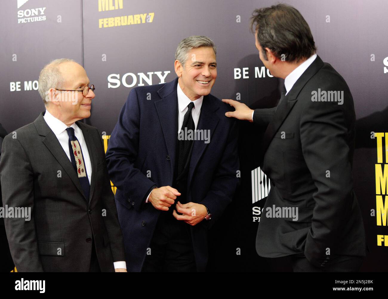 Actors Bob Balaban, left, George Clooney and Jean Dujardin, right ...