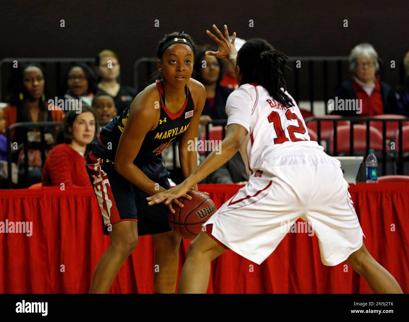 Maryland's Lexie Brown (4) lines up a shot over North Carolina State 's ...