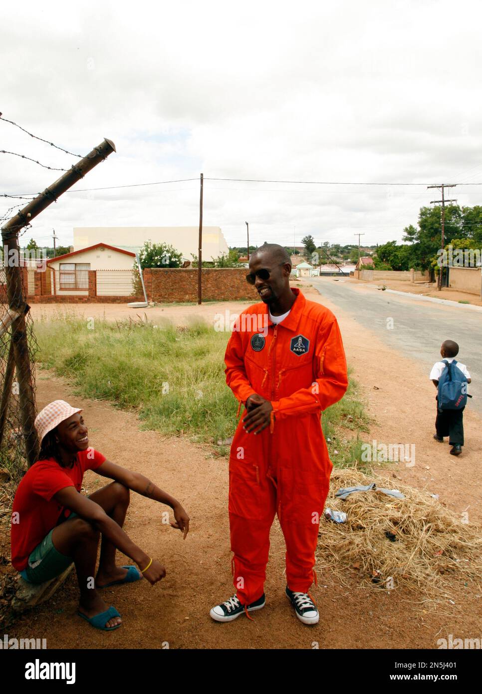 In this picture taken Monday, Feb. 3, 2014, Mandla Maseko, right ...