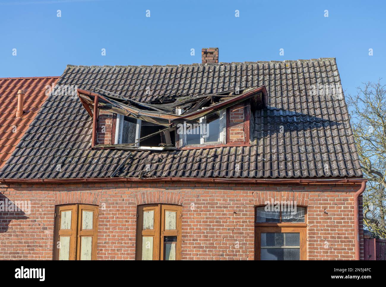 Detail shot of an old house with a destroyed roof Stock Photo - Alamy