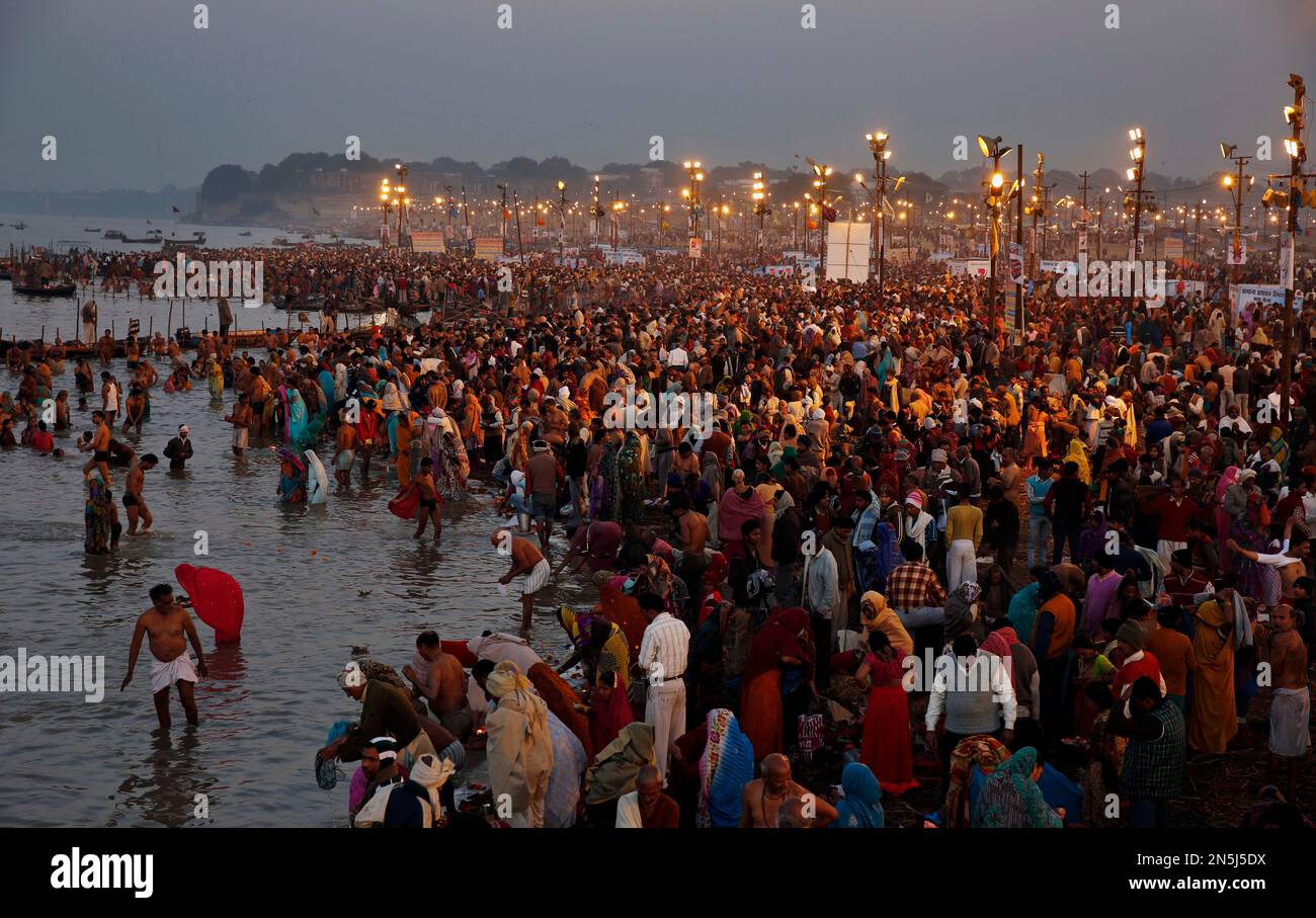 Hindu devotee throng Sangam, confluence of Hindu holy rivers of Ganges ...