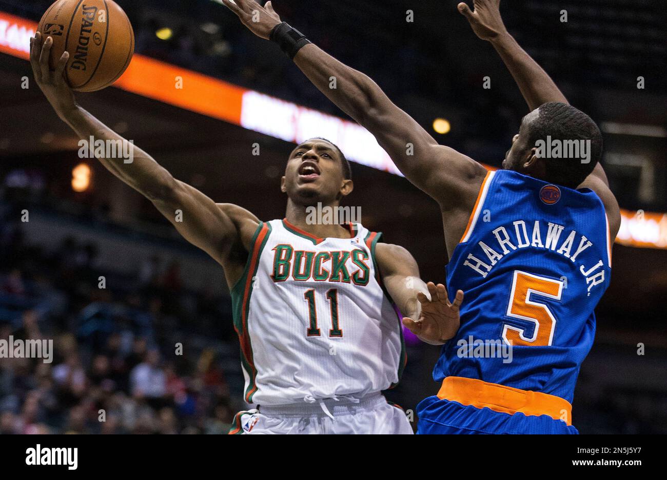Milwaukee Bucks' Brandon Knight drives past New York Knicks' Tim Hardaway Jr. during the second ...
