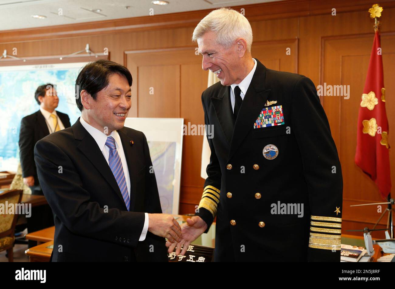 Adm. Samuel Locklear, commander of U.S. Pacific Command, right, shakes ...