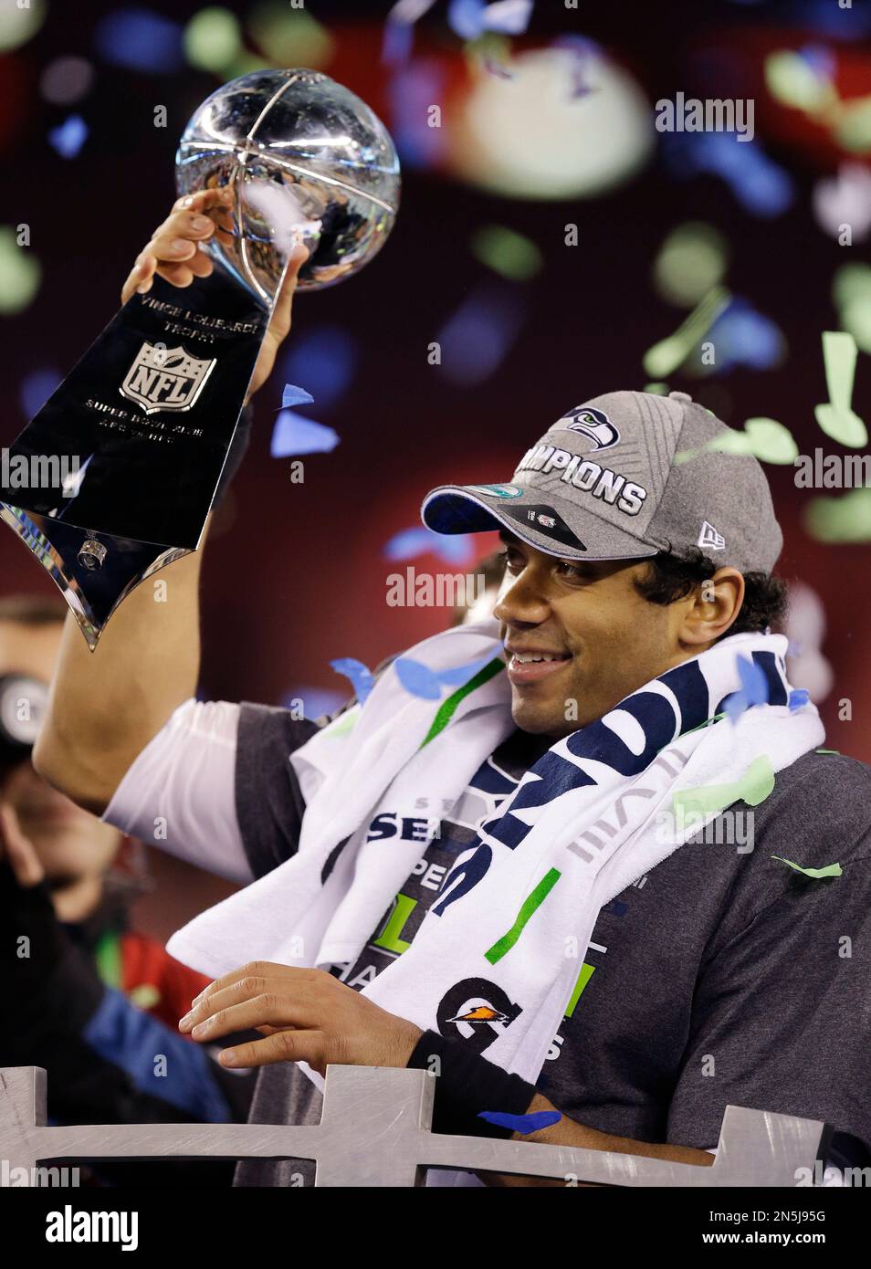 Seattle Seahawks' Russell Wilson holds the the Vince Lombardi Trophy ...