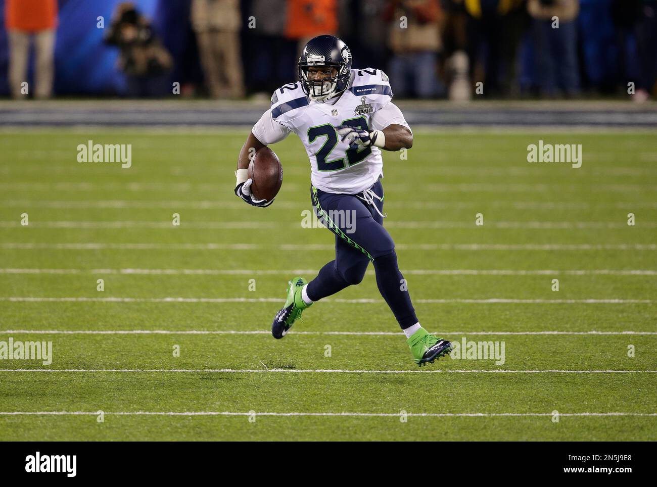 Seattle Seahawks' Robert Turbin runs against the Denver Broncos during ...