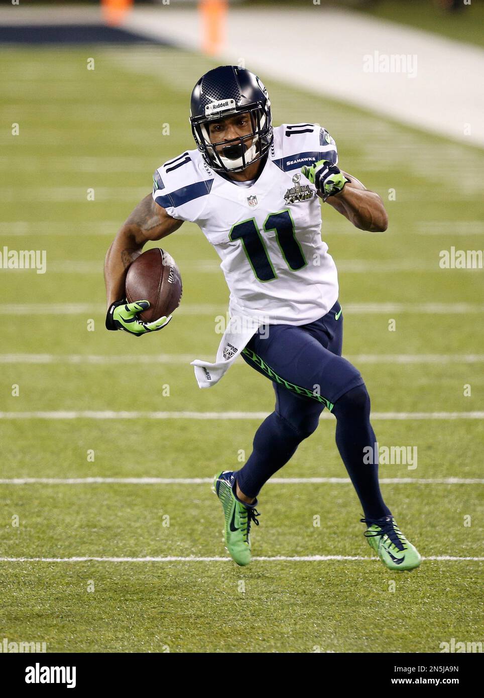 Seattle Seahawks' Percy Harvin (11) runs against the Denver Broncos ...