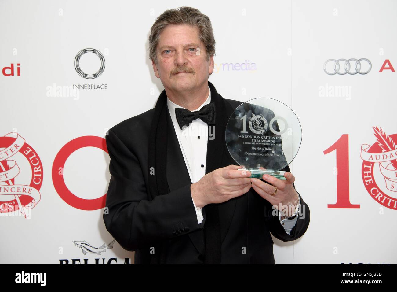 Andre Singer with his award for Documentary of the Year at The London ...