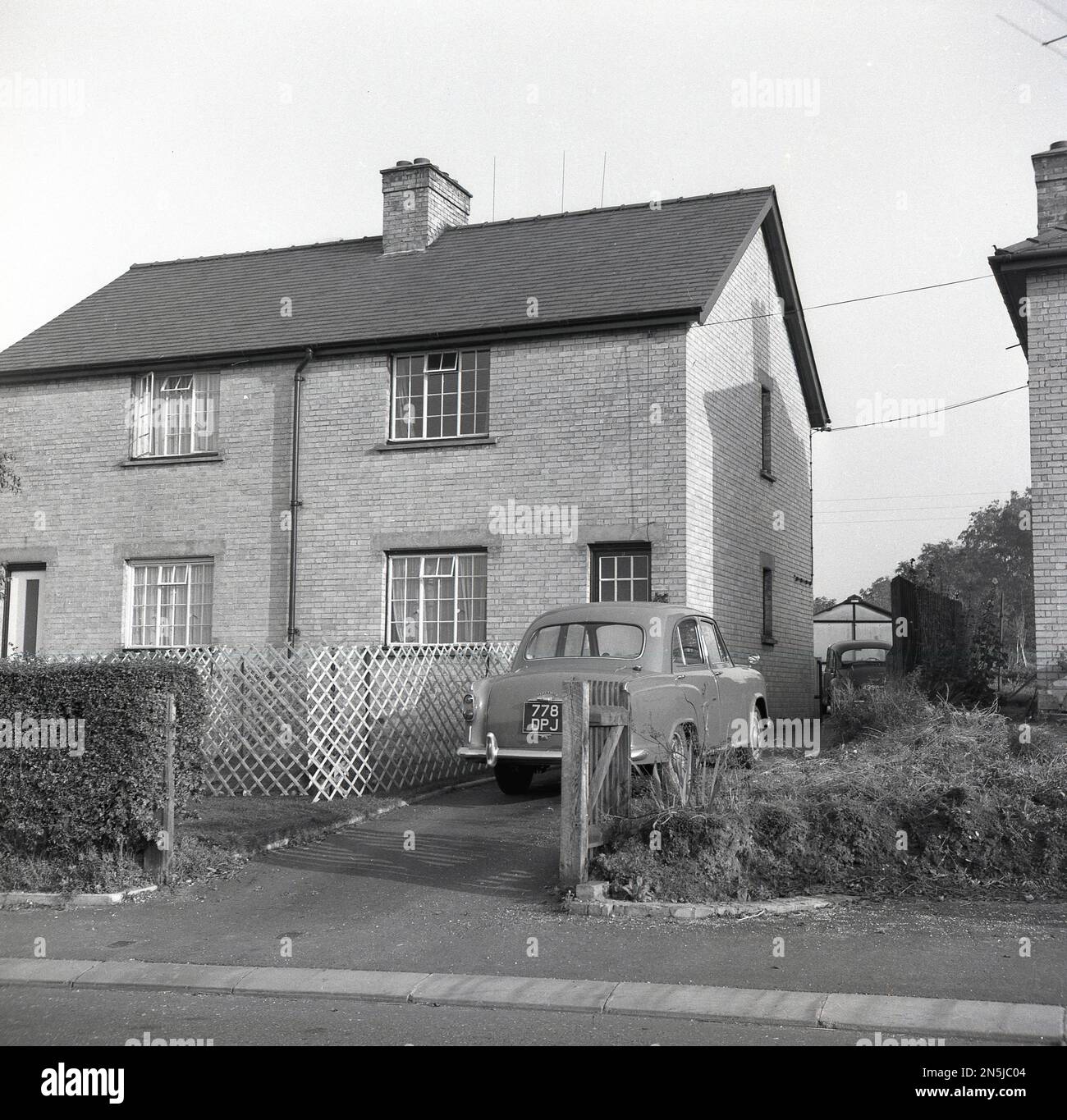 1963, historical, a motor car of the era, possibly an Austin Oxford ...