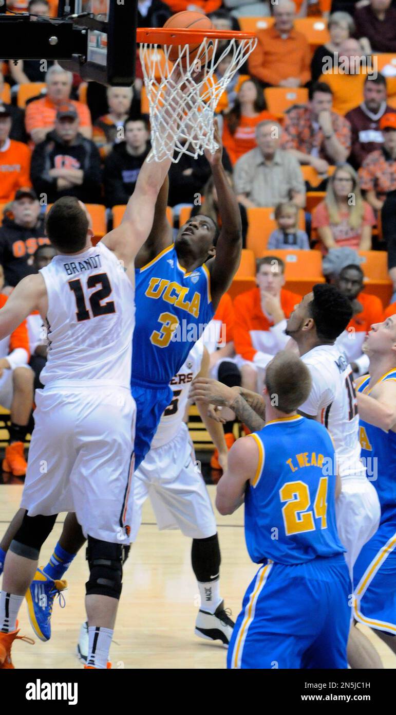UCLA's Jordan Adams (3) shoots against Oregon State's Angus Brandt (12 ...