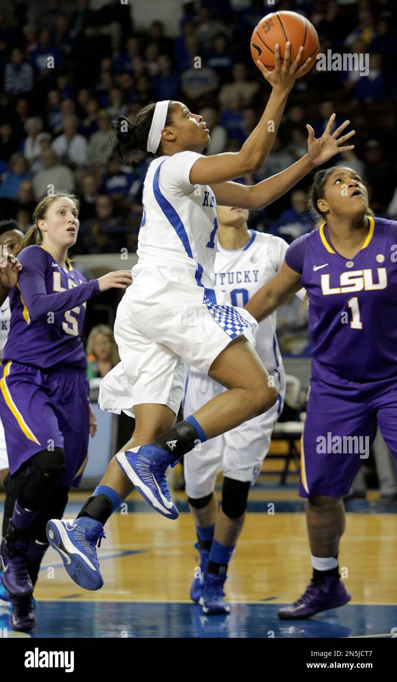 Kentucky's Bria Goss,center, shoots near LSU's Jeanne Kenney, left, and ...