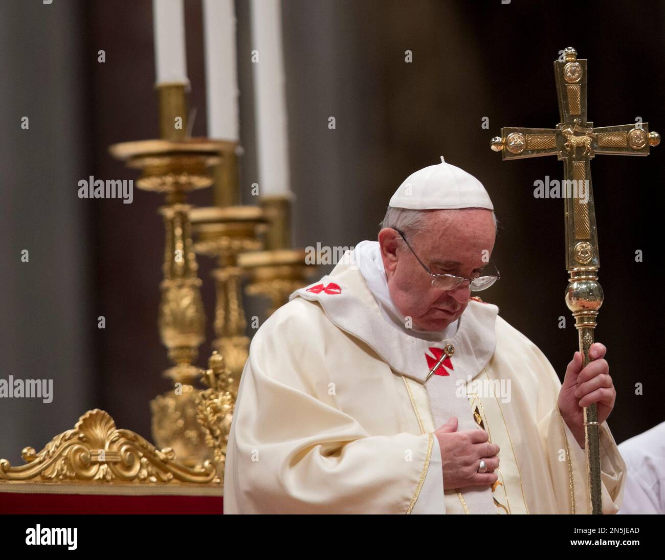 Pope Francis holds the pastoral staff as he celebrates a mass for ...