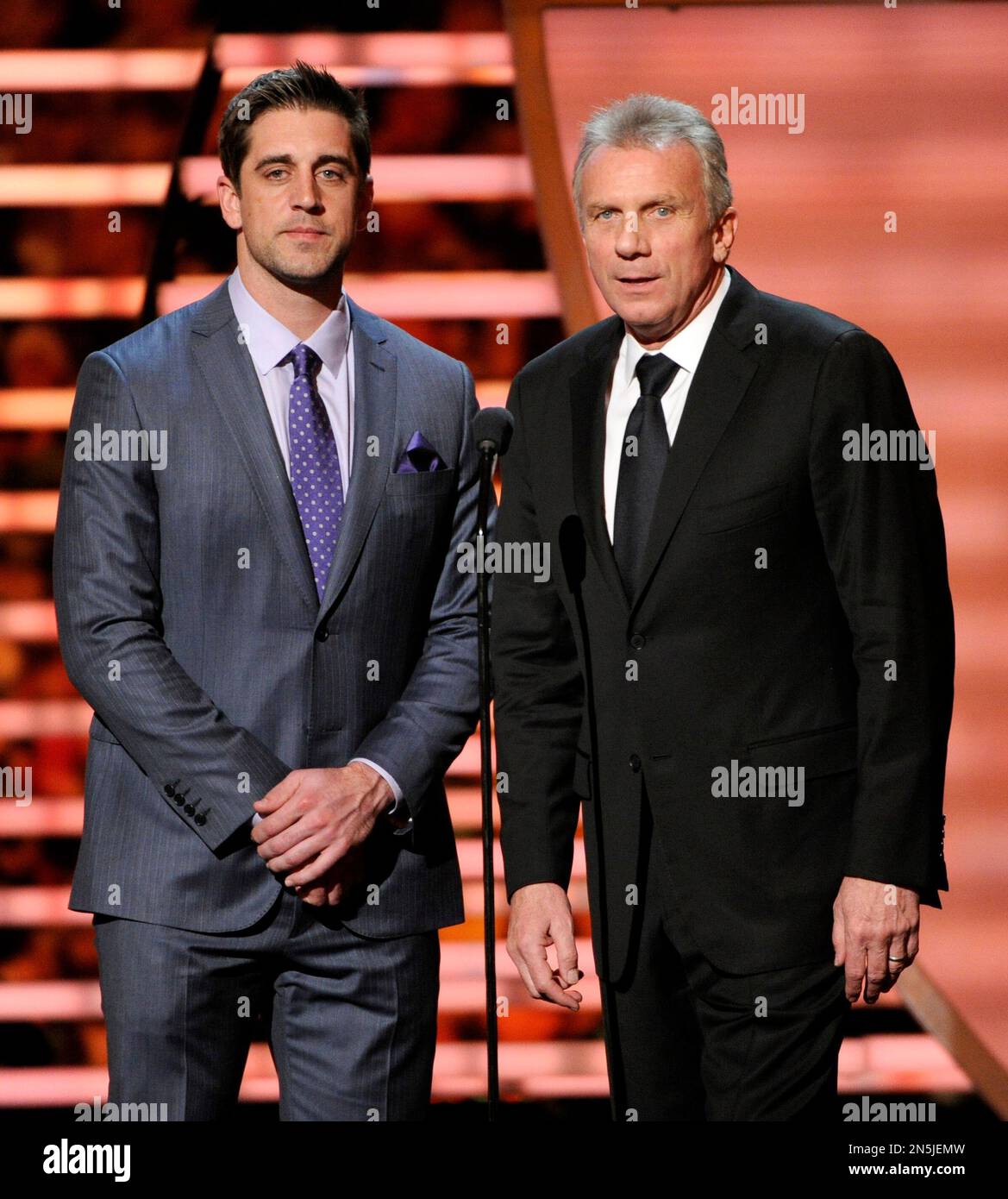 Aaron Rodgers of the Green Bay Packers, left, and Former NFL player Joe ...