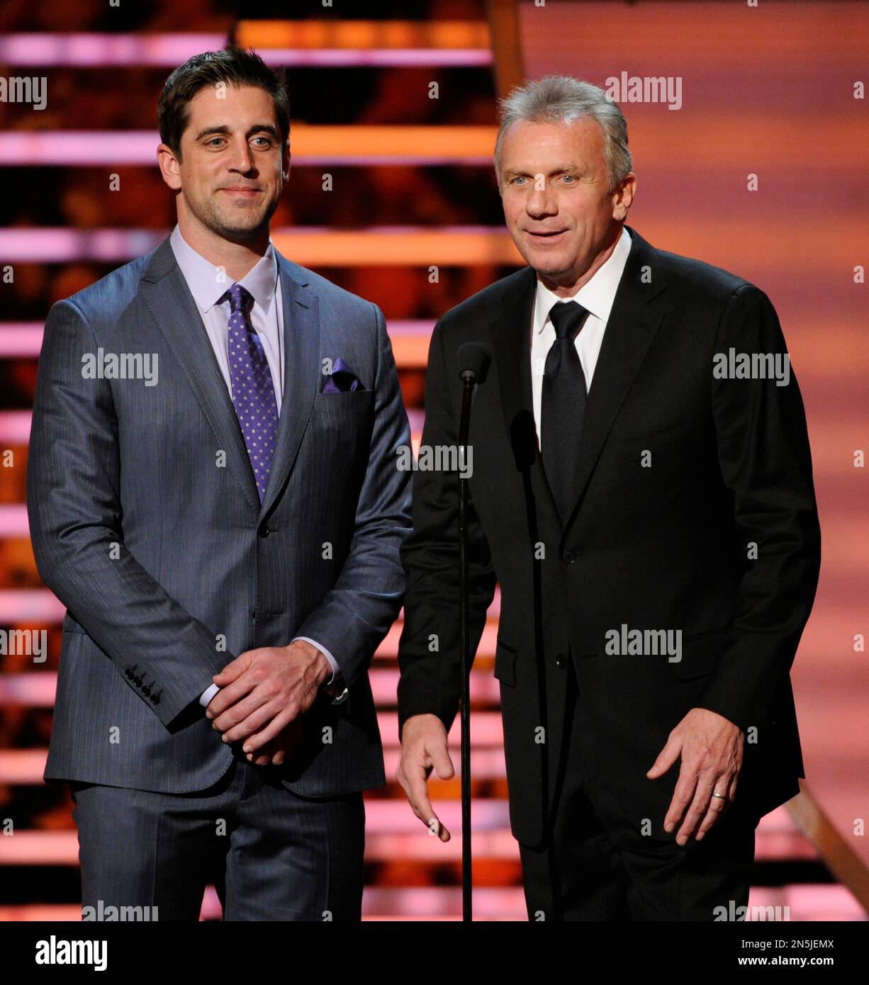 Aaron Rodgers of the Green Bay Packers, left, and Former NFL player Joe Montana present the ...