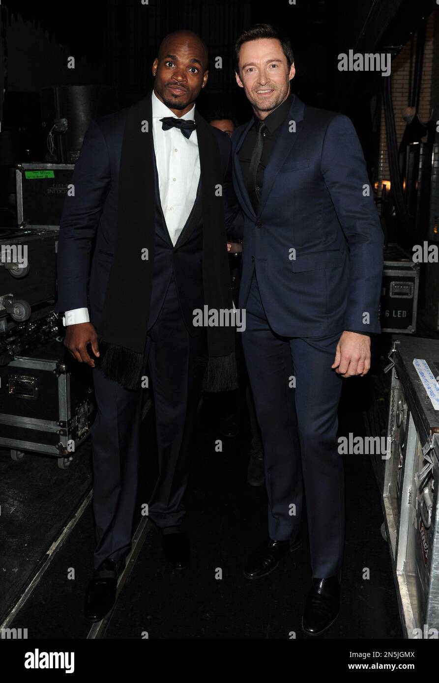 Adrian Peterson of the Minnisota Vikings, left, and Hugh Jackman at the ...