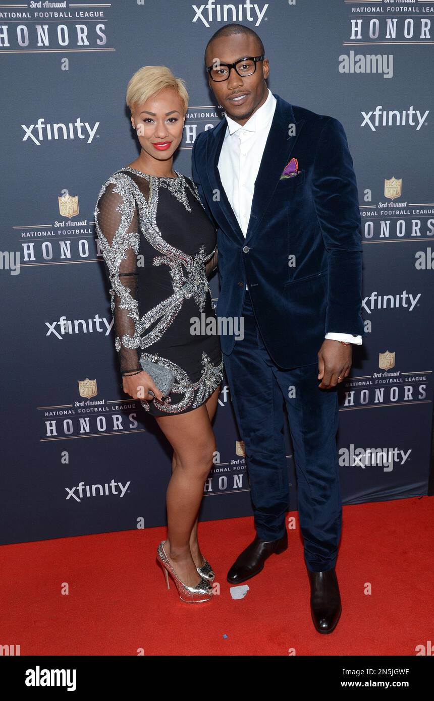 Michi Nogami, left, and Brandon Marshall of the Chicago Bears arrive at ...