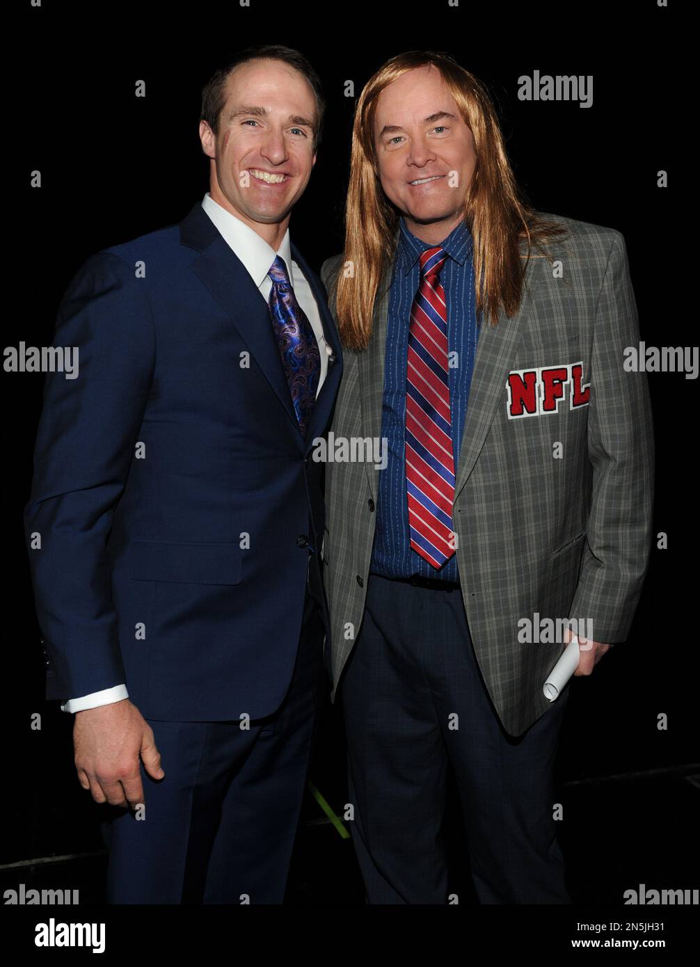 Drew Brees, left, and David Koechner pose backstage at the 3rd annual ...