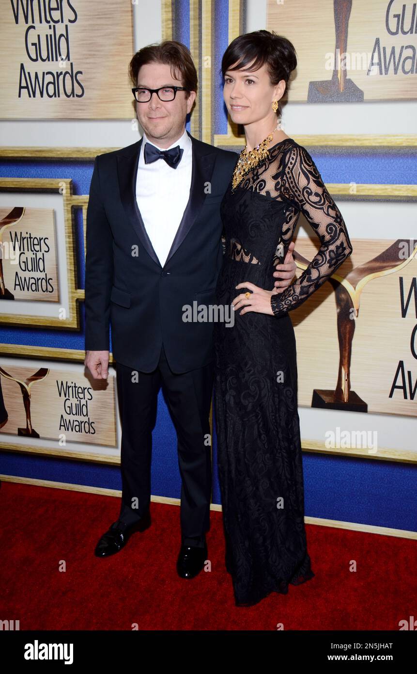 Eric Warren Singer, left, and guest arrive at the Writers Guild Awards ...