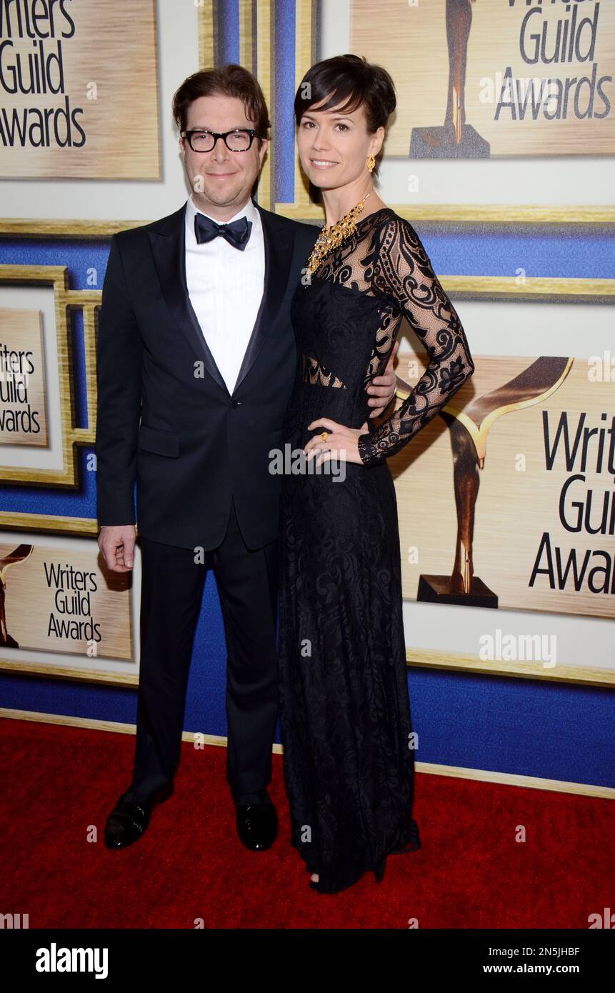 Eric Warren Singer, left, and guest arrive at the Writers Guild Awards ...