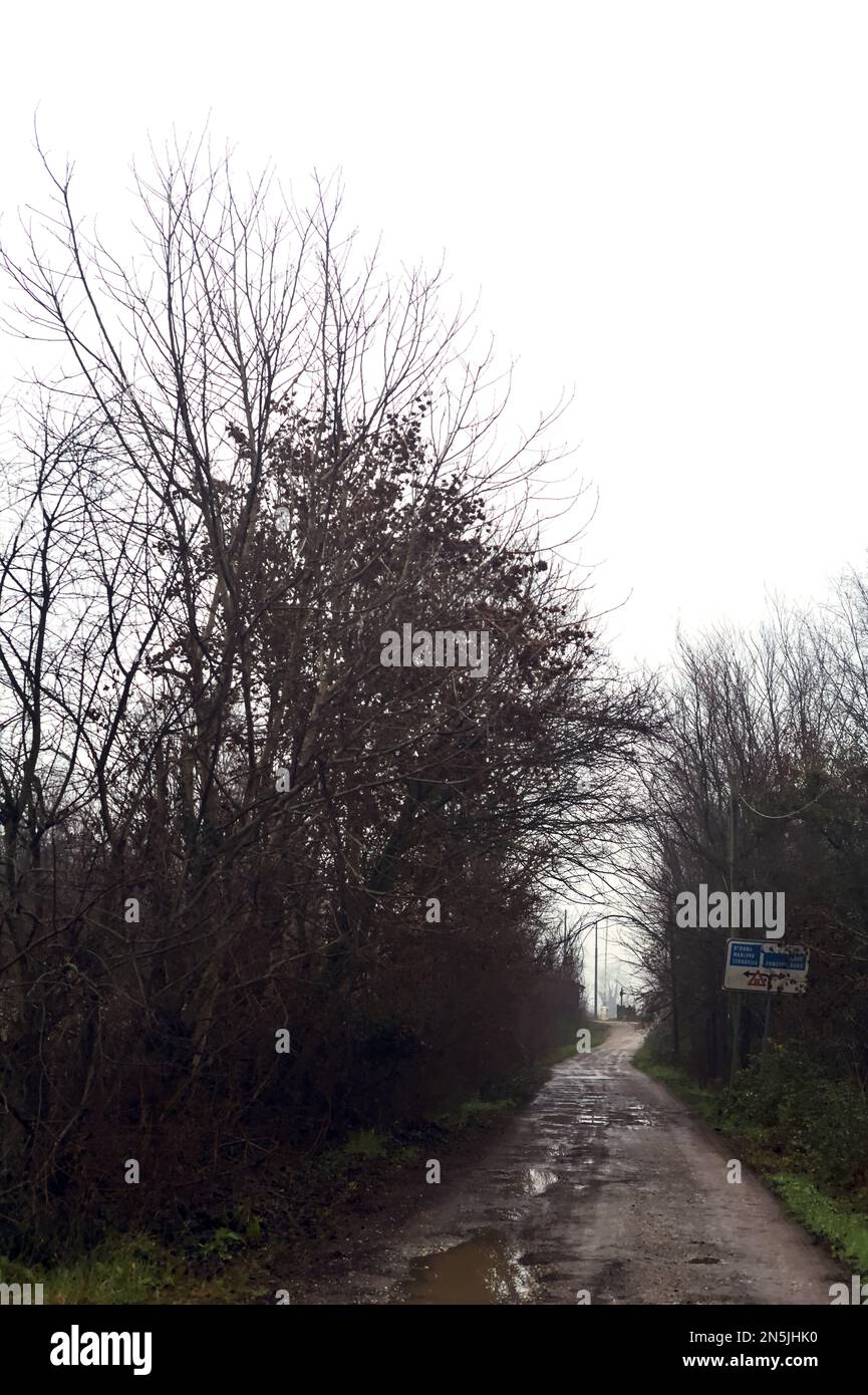 Deep puddle on a dirty road hi-res stock photography and images - Alamy