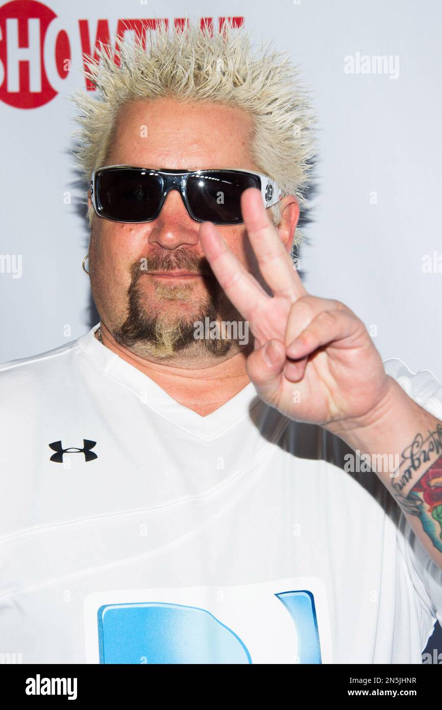 Guy Fieri attends DIRECTV's 8th annual Celebrity Beach Bowl on Saturday ...