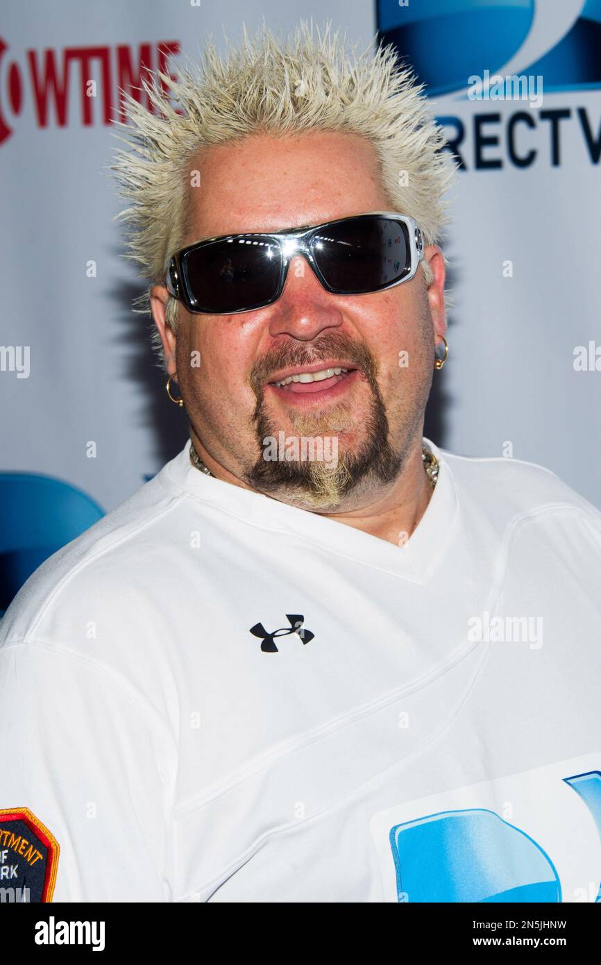 Guy Fieri attends DIRECTV's 8th annual Celebrity Beach Bowl on Saturday ...