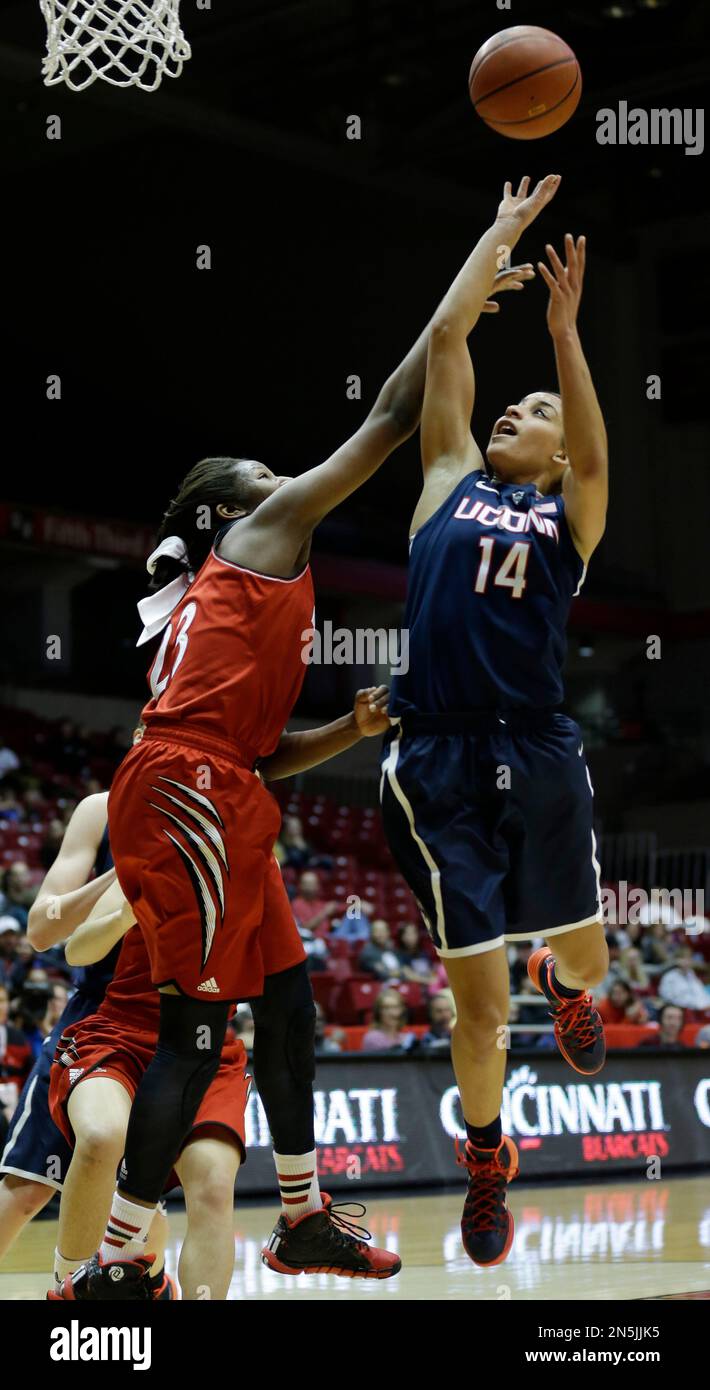 Connecticut guard Bria Hartley (14) is fouled by Cincinnati guard ...