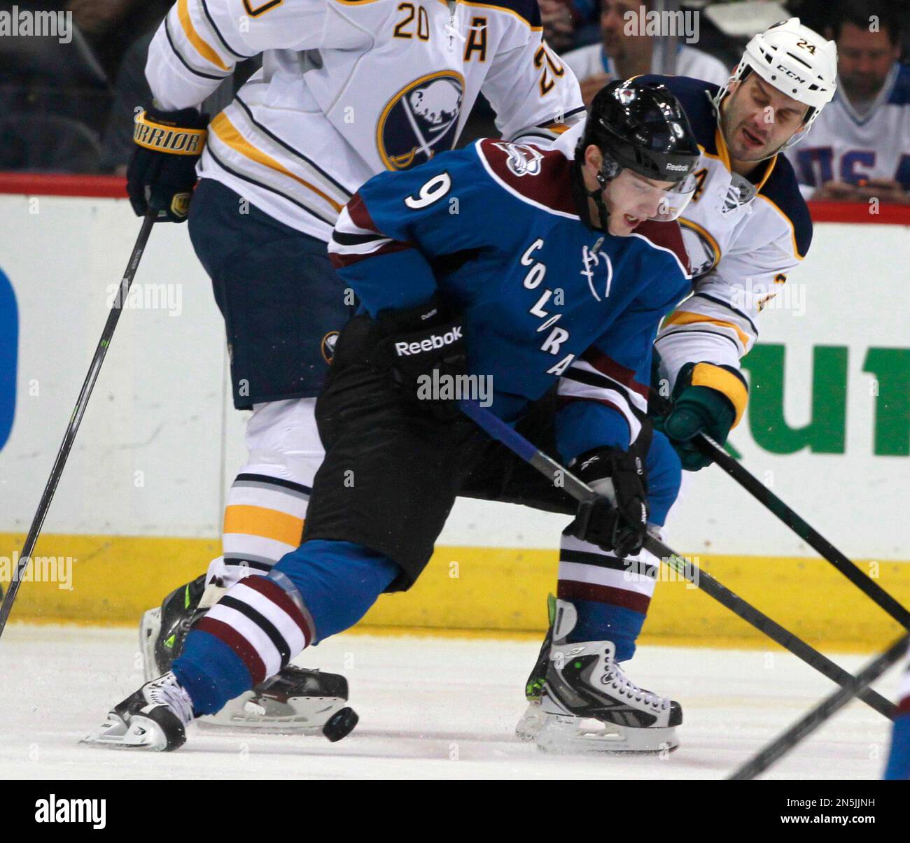 Colorado Avalanche's Matt Duchene (9) battles for control of the puck ...