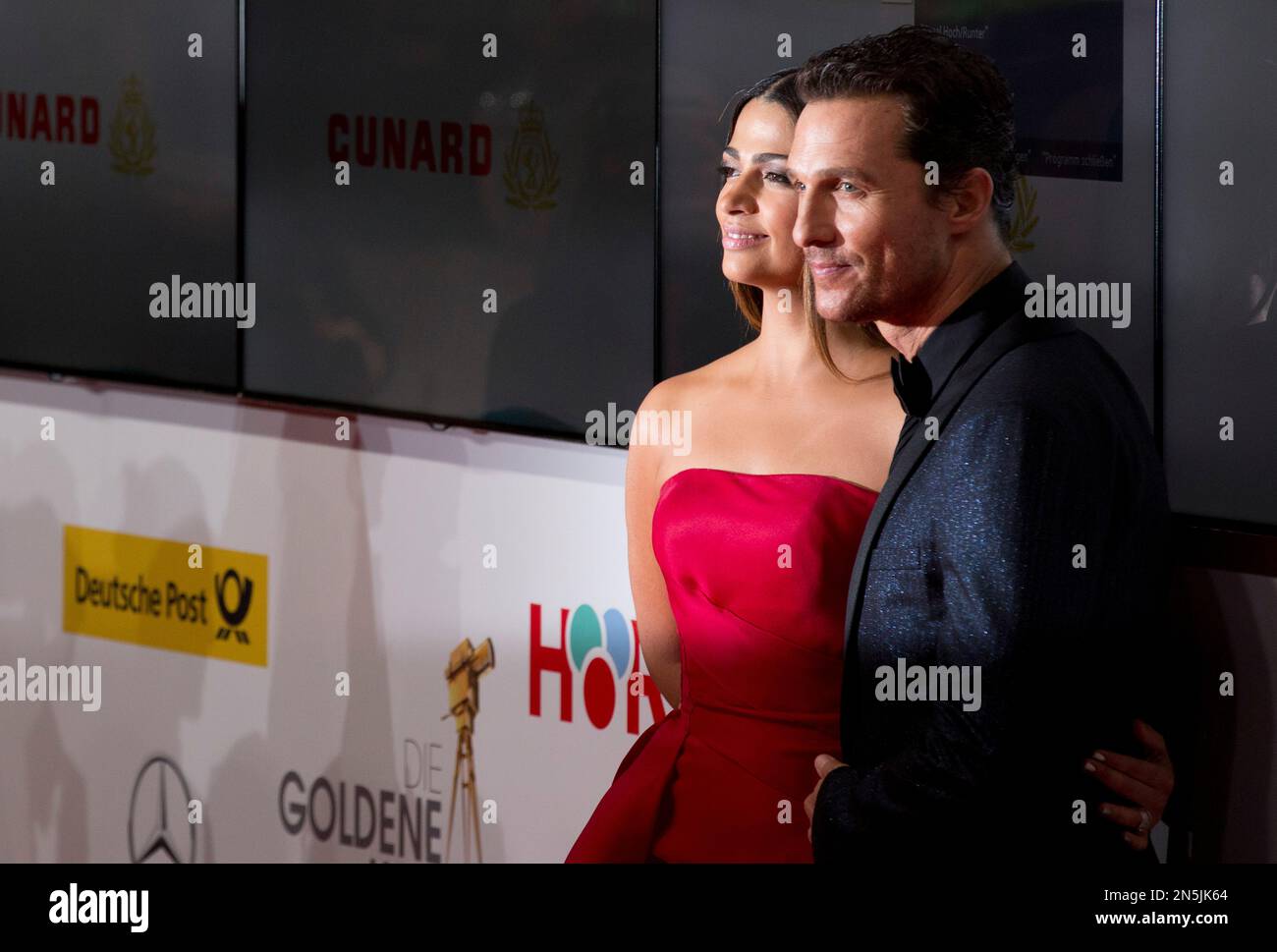 US film actor Matthew McConaughey, and his wife Camila Alves, arrive on ...