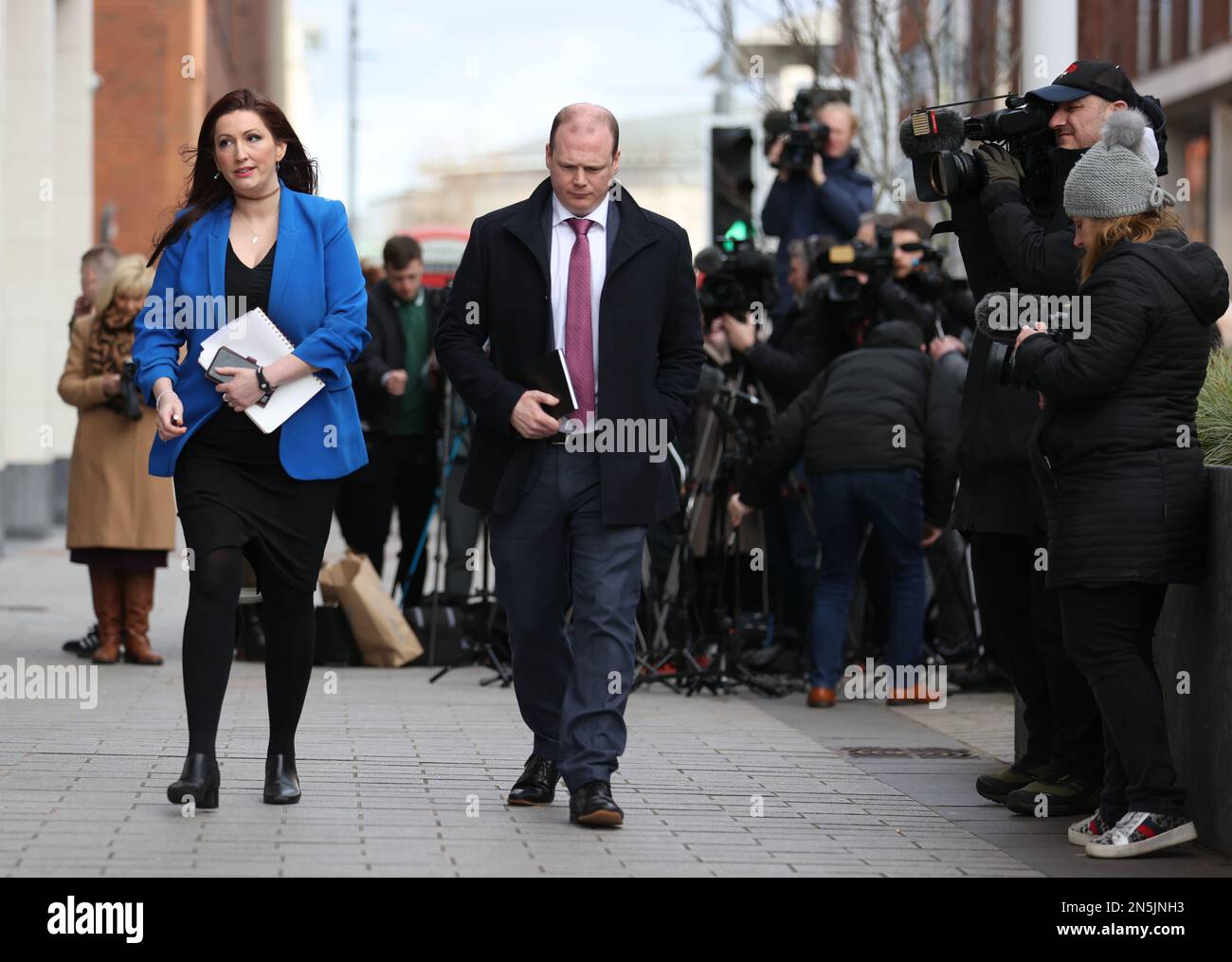 Gordon Lyons (right) and Emma Little-Pengelly from the DUP leave the ...