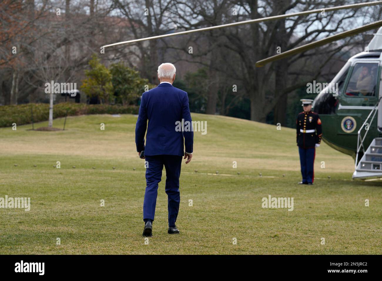 U.S. President Joe Biden walks to board Marine One helicopter on the ...