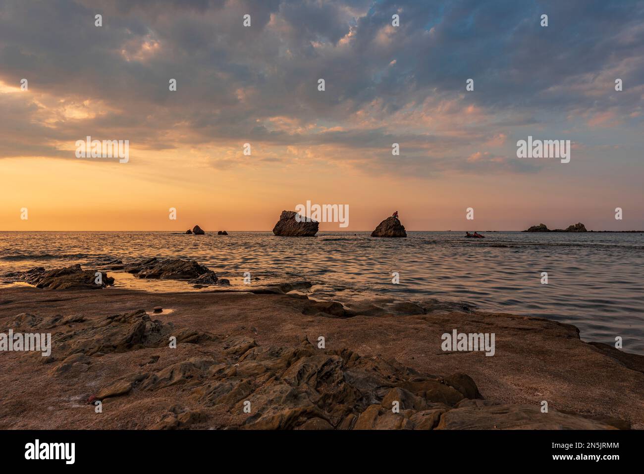 Settefrati beach in Mazzaforno bay at dusk, Sicily Stock Photo - Alamy