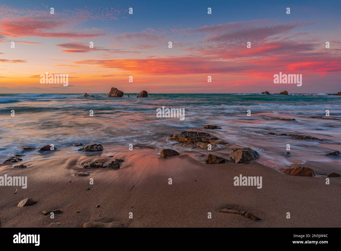 Settefrati beach in Mazzaforno bay at dusk, Sicily Stock Photo - Alamy
