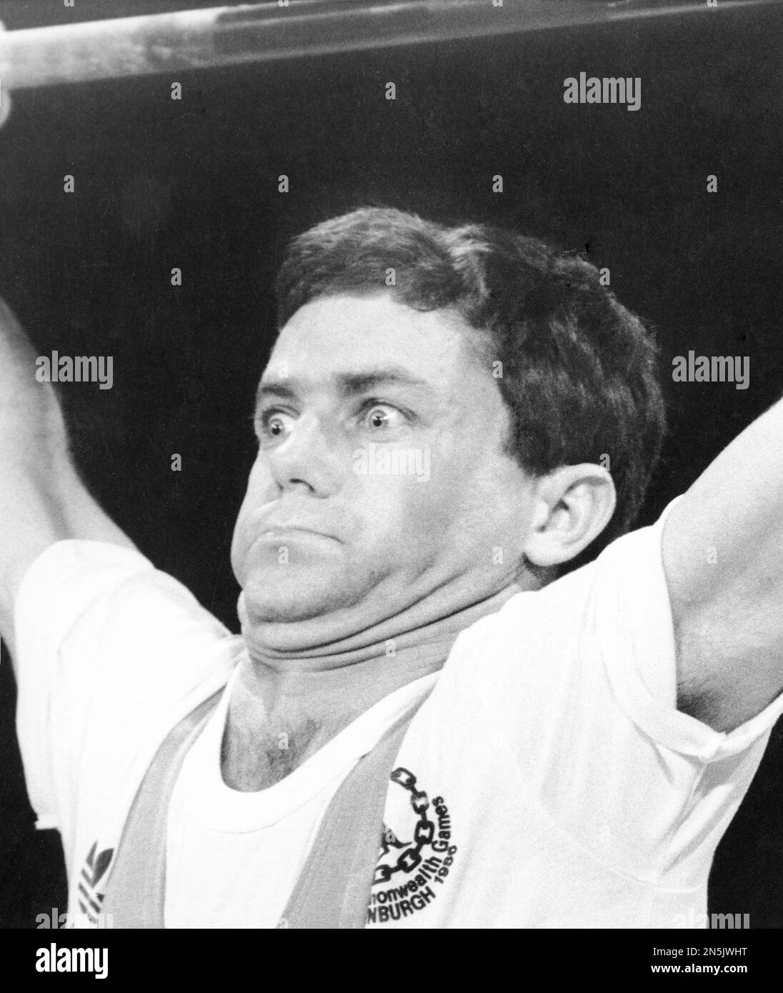 Greg Hayman of Australia, the strain showing in his neck and in the ...