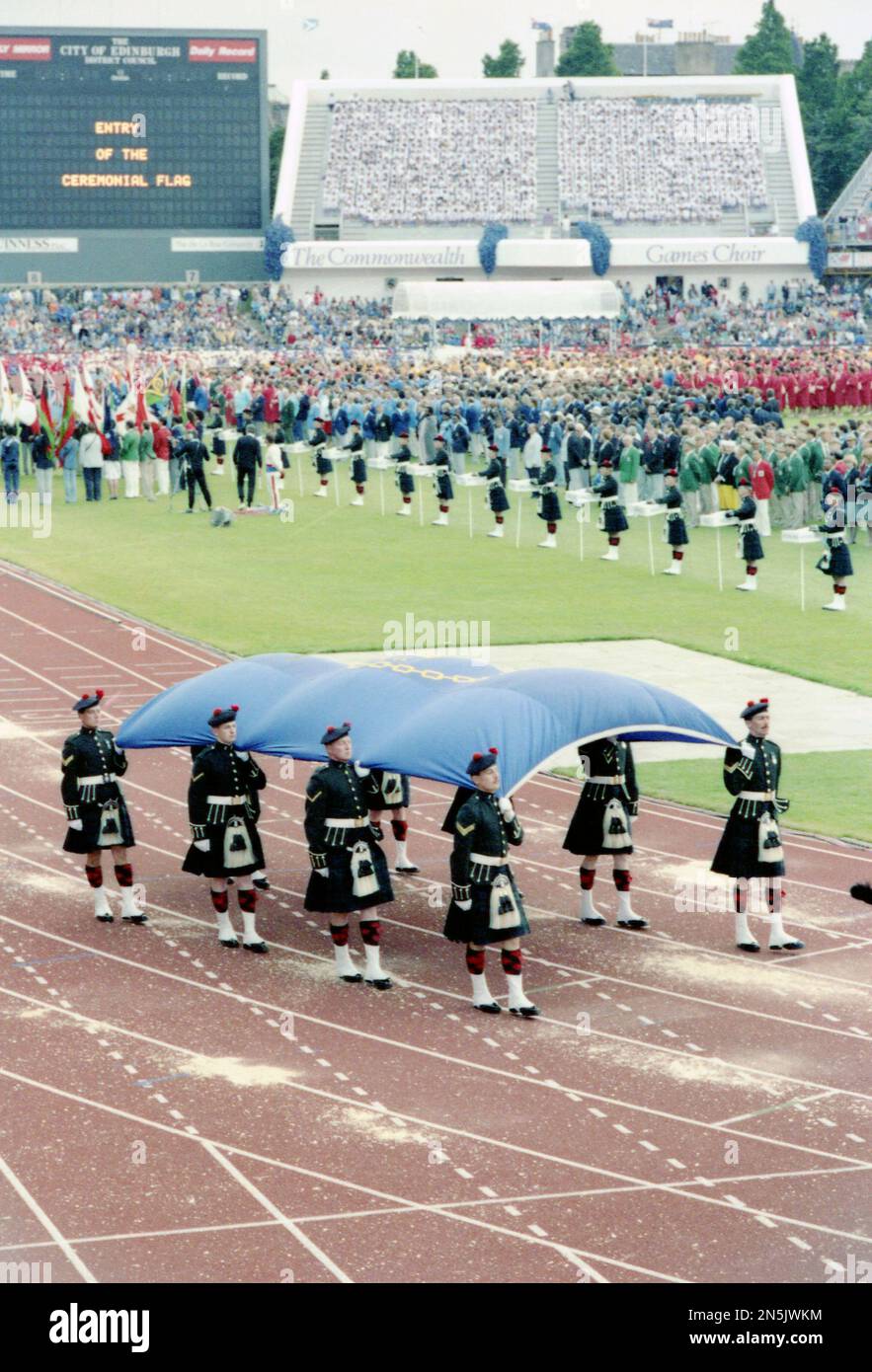 The flag of the Commonwealth Games Federation is paraded at the opening ...