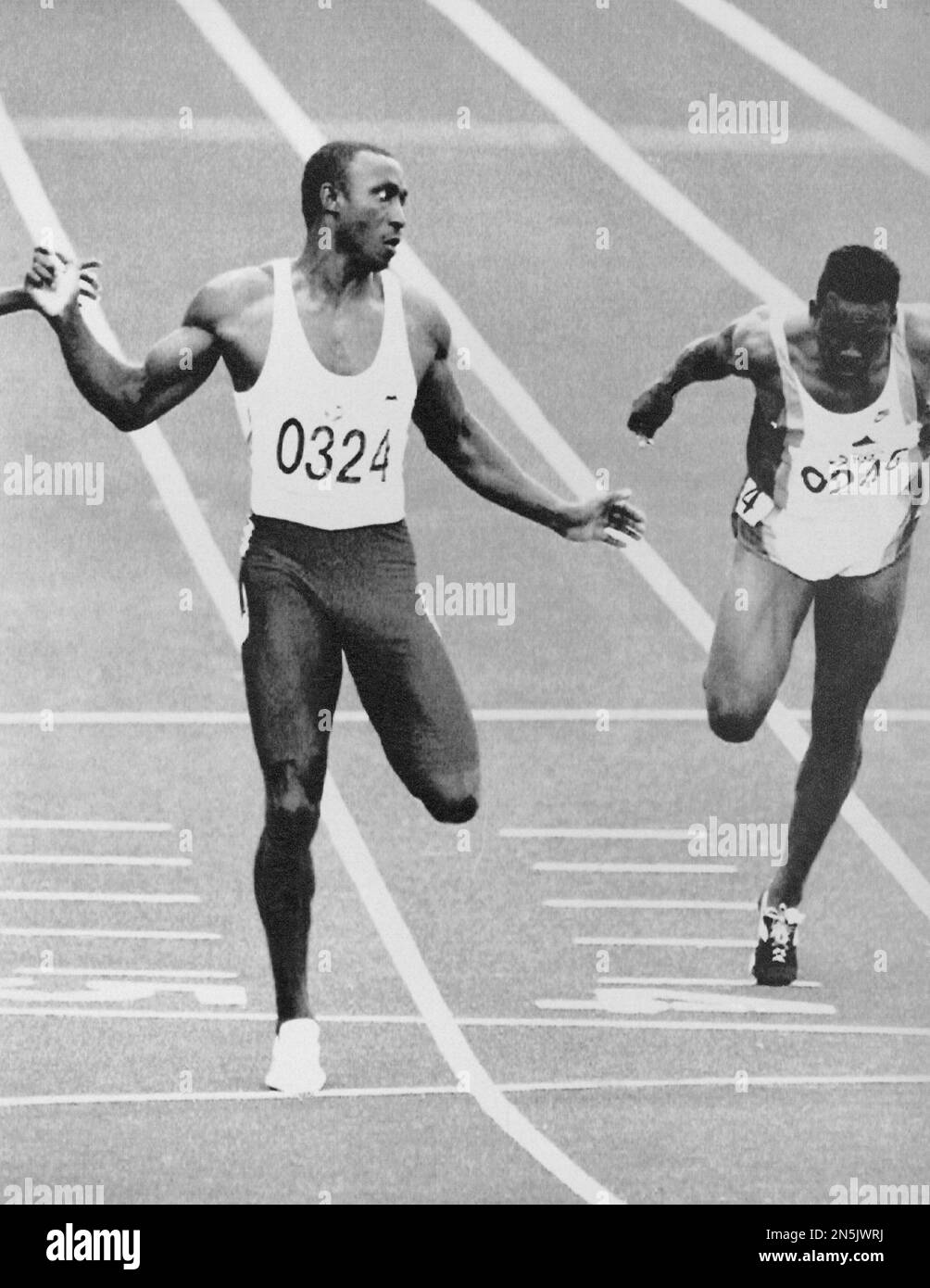 Linford Christie of England at the finish of the 100mt Final to win the ...