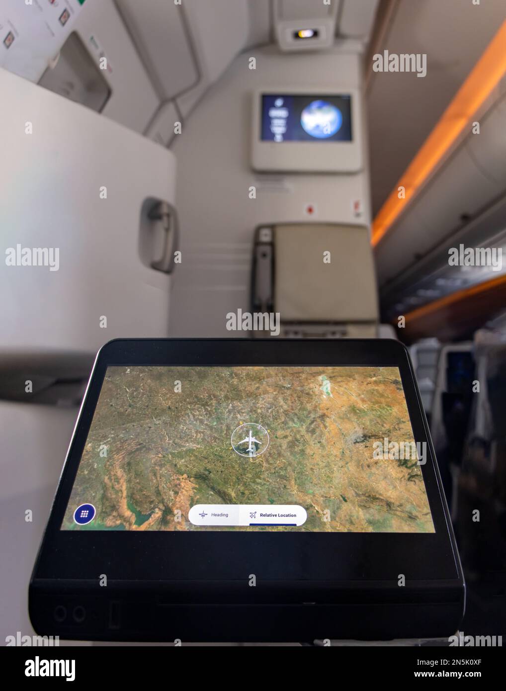 Route of flying plane on passenger monitor map Stock Photo - Alamy