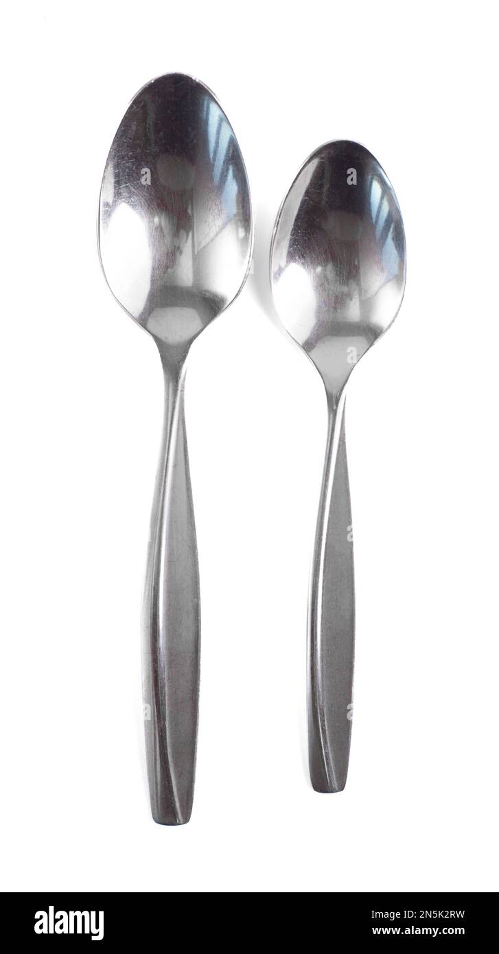Two Stainless Steal Spoons a Large and Small Isolated on a White ...