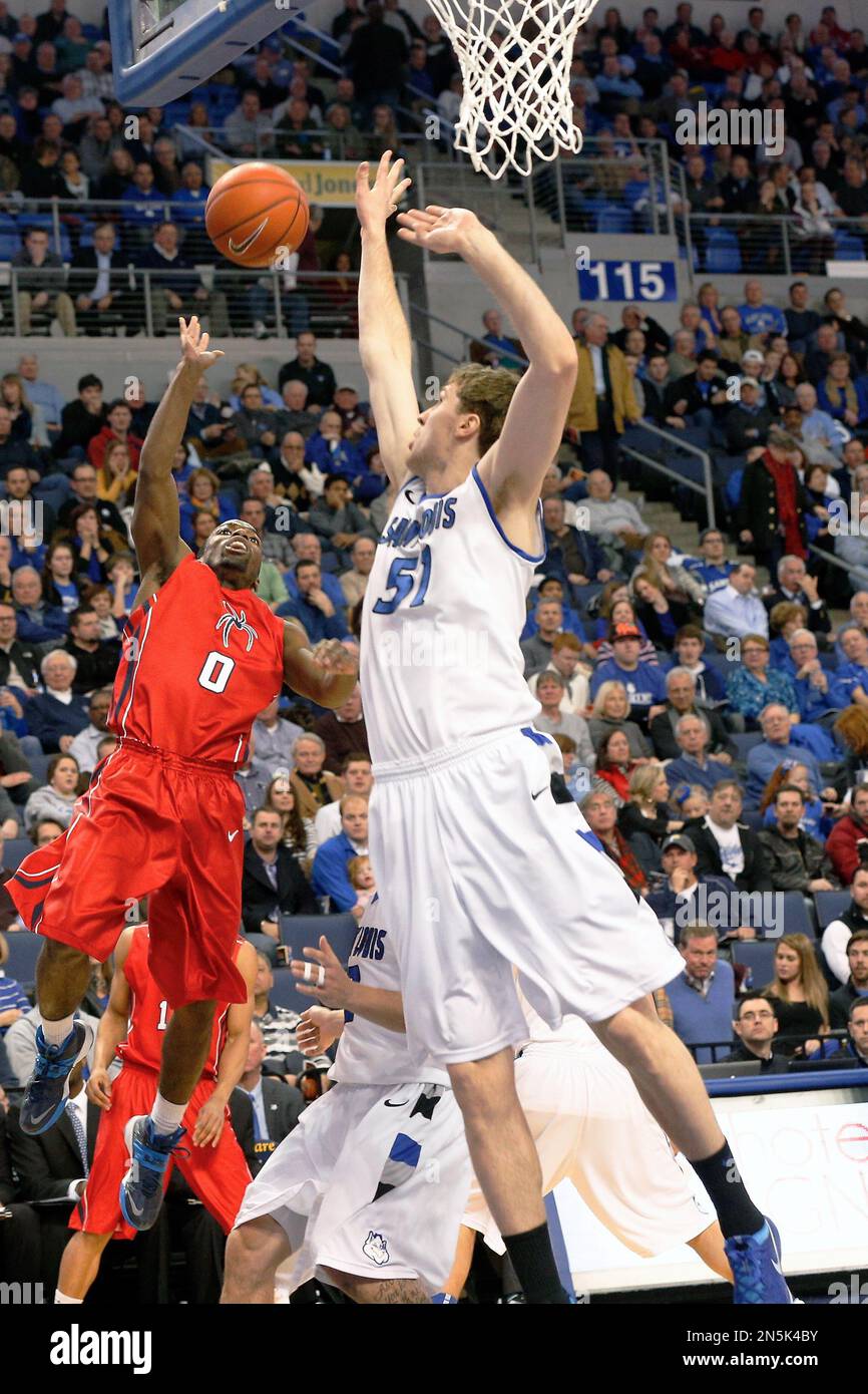 Richmond's Kendall Anthony (0) shoots as Saint Louis' Rob Loe (51 ...