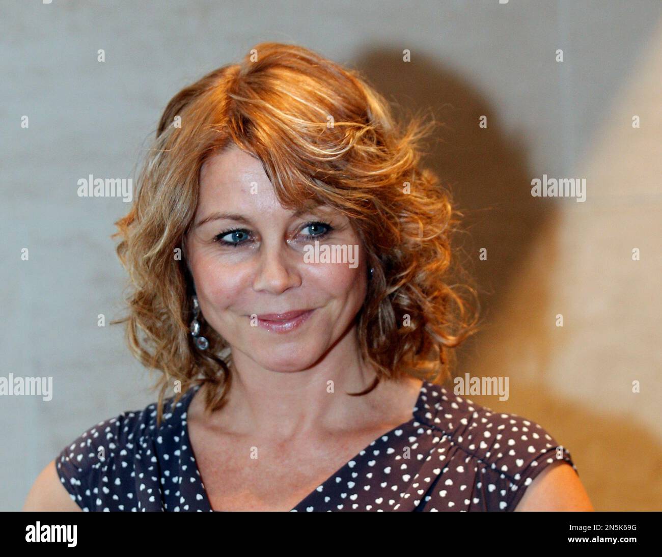 Danish actress Anne Louise Hassing poses for photographers as she ...