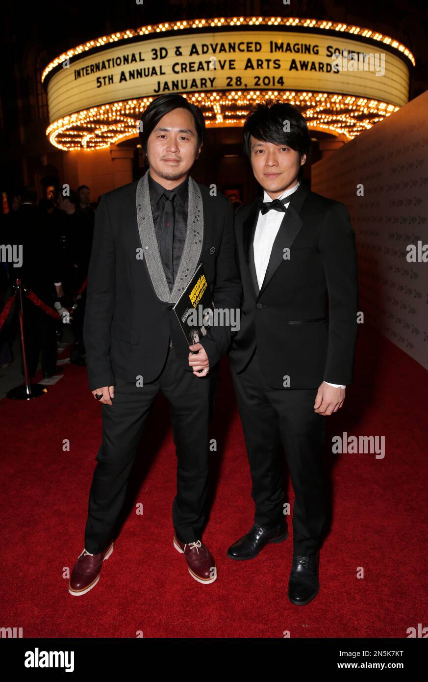 Peter Ming Feng Lin and Wen Shang Yi attend the 2014 International 3D ...