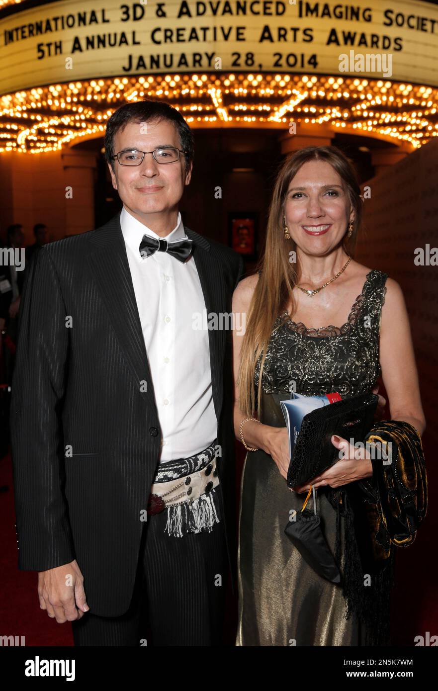 Robert Neuman and guest attend the 2014 International 3D and Advanced ...