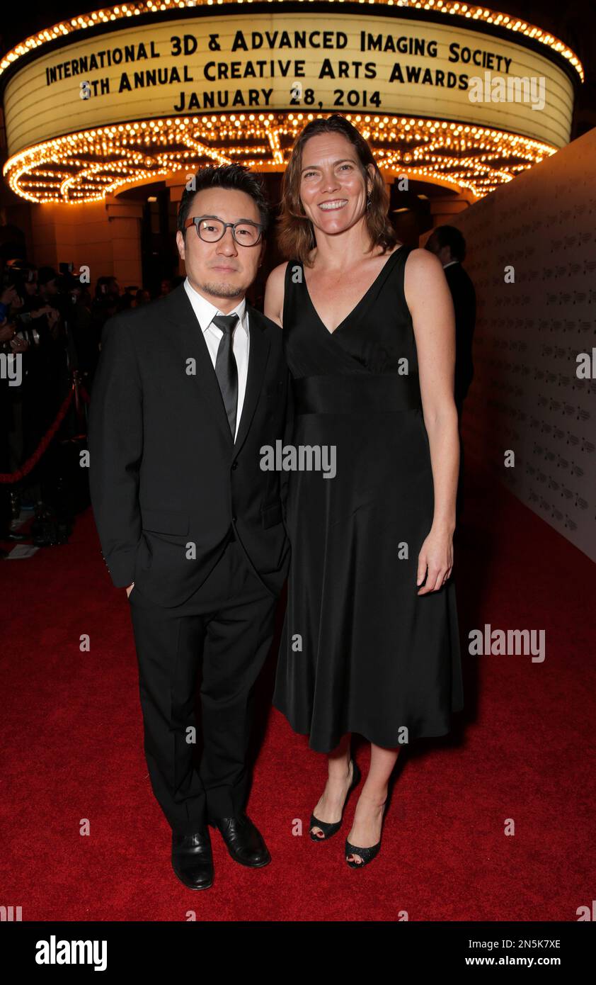 Yong Duk Jhun and Jane Hartwell attend the 2014 International 3D and ...